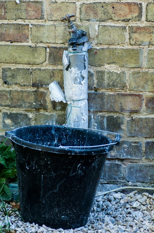 Tap and bucket stock image. Image of handle, field, flow - 20719965