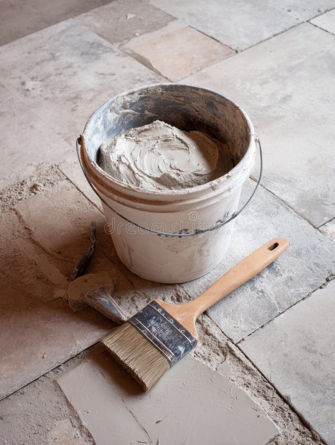 Bucket of Tile Adhesive with Tools on Construction Site Floor Ready for ...