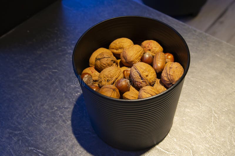 Bucket of Walnuts As Seen in Local Market on a Metallic Table with Dark ...