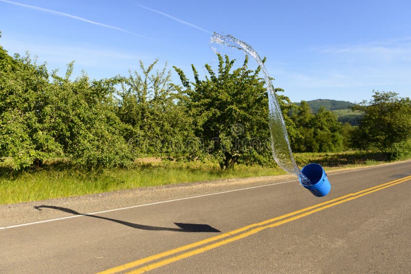 Bucket of Water Being Thrown Stock Image - Image of float, shadow: 49358377