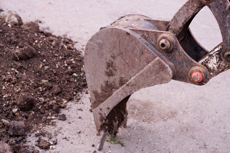 Bucket at work stock photo. Image of asphalt, bucket - 63775552
