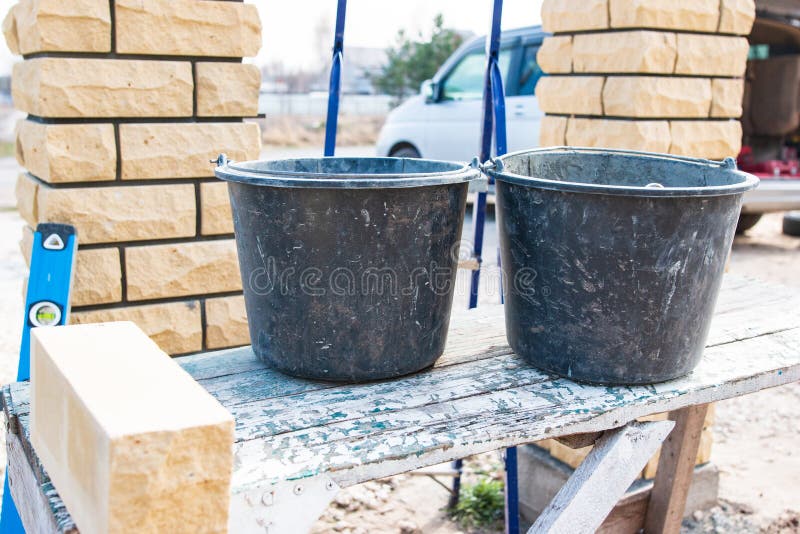 Buckets for Construction Work at a Construction Site Stock Photo ...