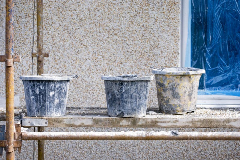 Buckets on scaffold stock photo. Image of dash, plaster - 26418202