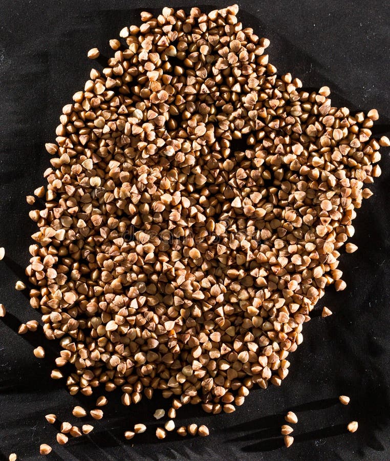 Buckwheat on a Black Background Stock Photo - Image of agriculture ...