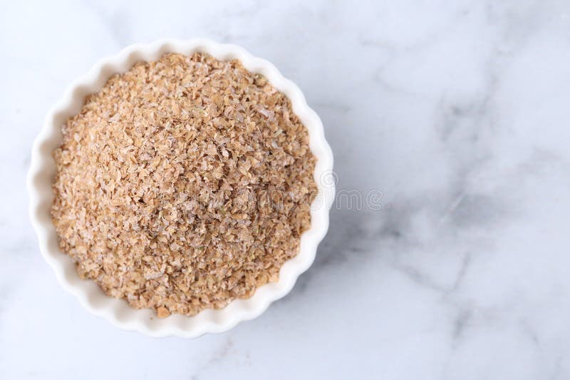 Buckwheat Bran in Bowl on White Marble Table, Top View. Space for Text ...
