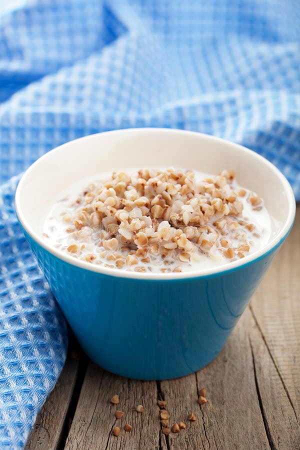 Buckwheat groats with milk stock image. Image of breakfast - 31726335