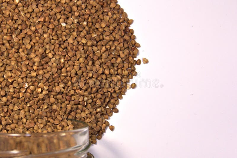 Buckwheat in a Transparent Jar. on a Gray Background. Top View Stock ...