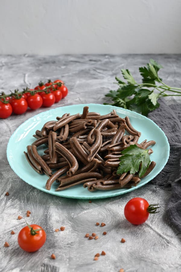 Buckwheat Spaghetti. Buckwheat Pasta on a Light Grey Table Stock Image ...
