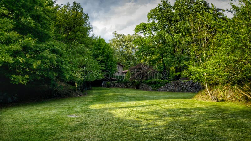 Hidden house by trees stock image. Image of hidden, hotel - 115301711