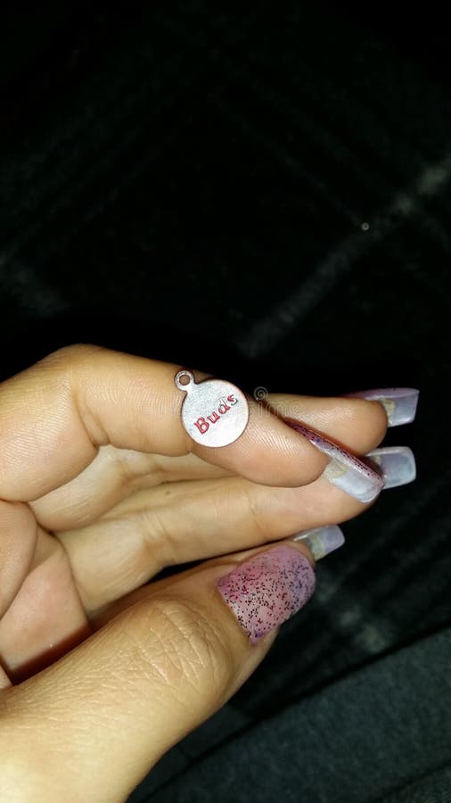 Bud stock image. Image of nails, pendent, words, love - 100553897