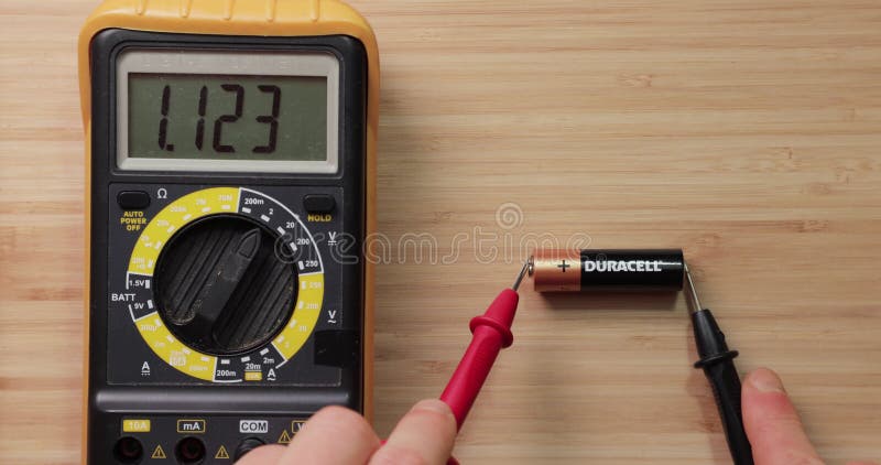 AA Battery Cells Voltage Checking Stock Video - Video of battery ...