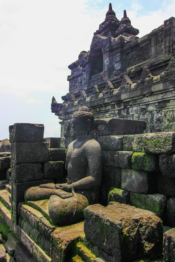 Buddha in Borobudur Temple at Sunrise. Indonesia. Stock Image - Image ...