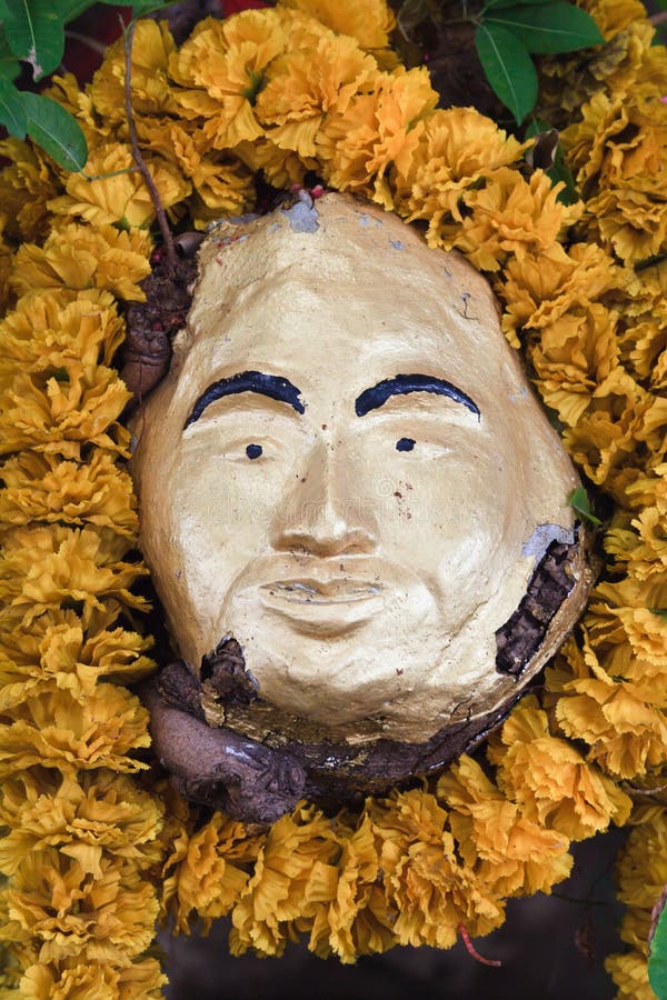 Buddha Face with Yellow Flower Stock Image - Image of stone, sculpture ...