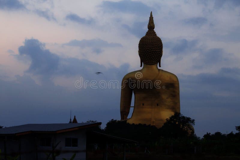 Buddha on field at sky stock image. Image of religion - 172850981