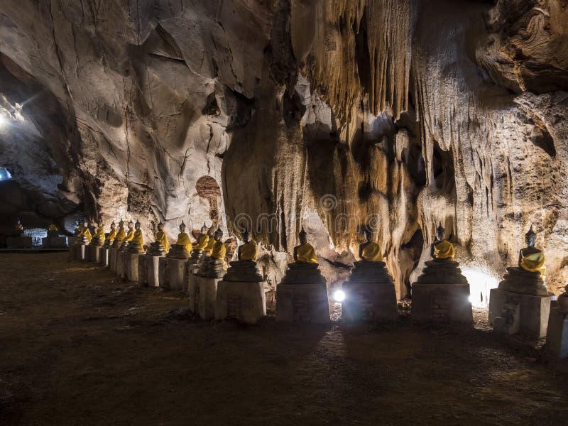 Buddha figures in a cave editorial photography. Image of serene - 177841802