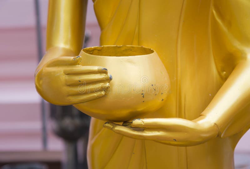 Buddha hand and alms bowl stock image. Image of architecture - 58527701