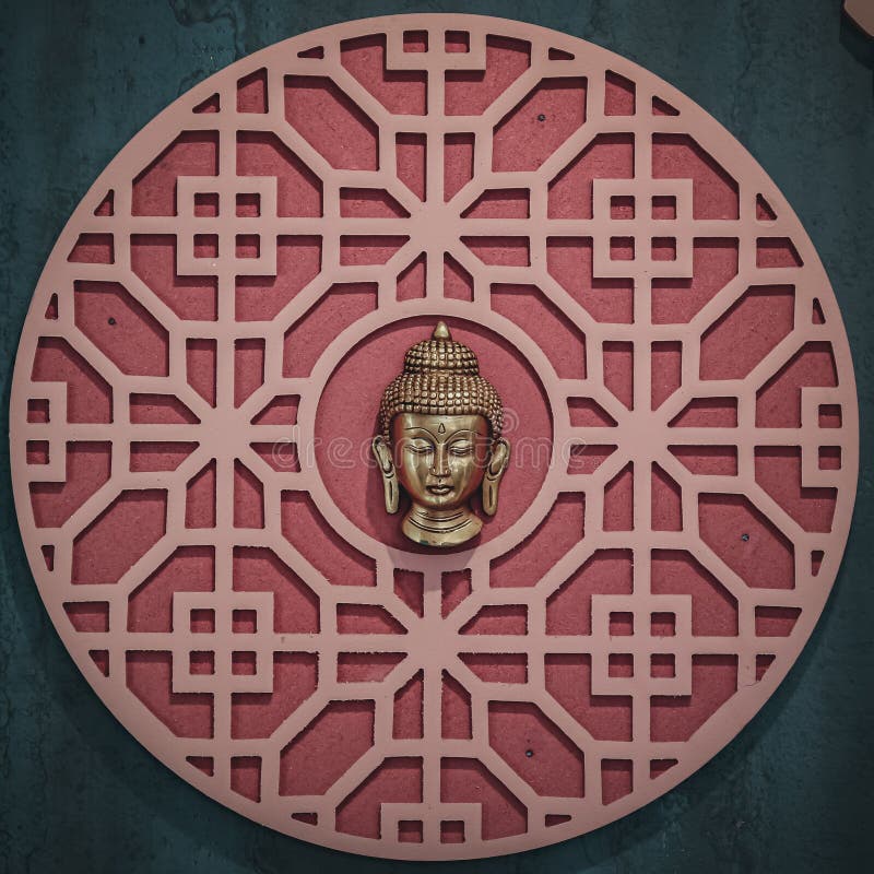 Buddha Head in a Circular Pattern on a Wall Stock Image - Image of wall ...