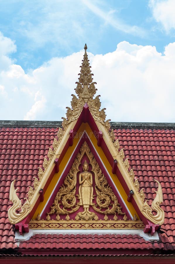 Buddha image at roof gable stock image. Image of roof - 26875279