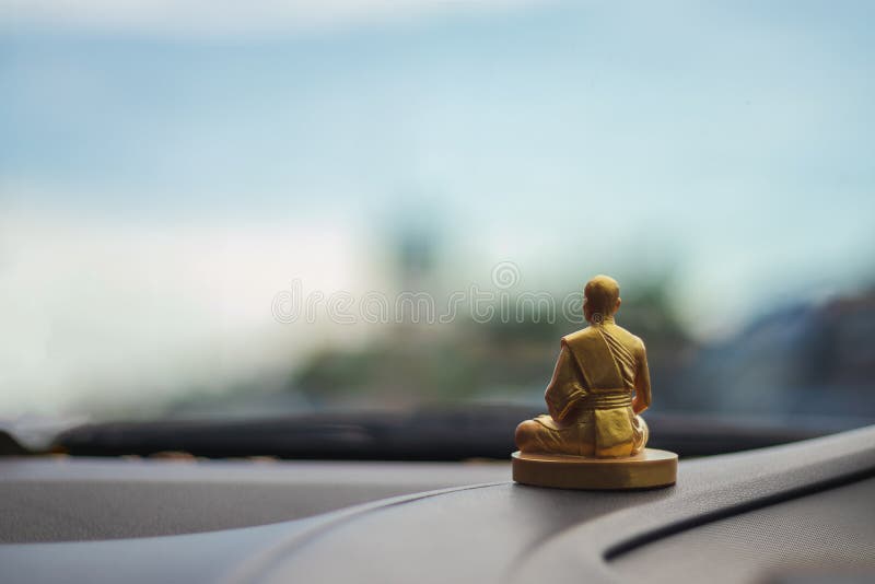 The Buddha Placed in Front of the Car. Stock Image - Image of marigold ...