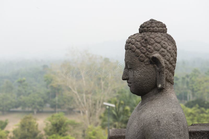 Buddha Profile in Buddhist Temple of Borobudur, Java Stock Photo ...
