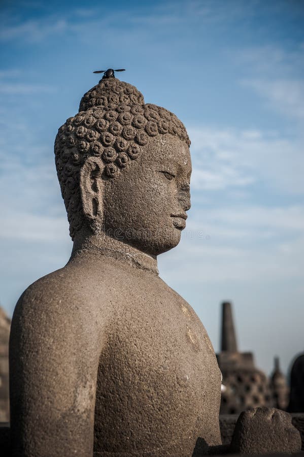 Buddha Statue at Borobudur Temple, Java, Indonesia Stock Photo - Image ...