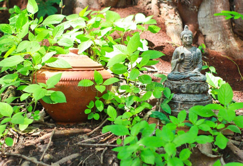 Buddha statue with pot stock image. Image of buddhism - 26567365