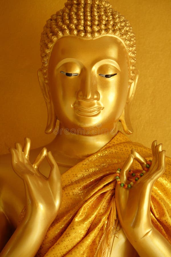 Buddha Statue Standing Next To the Doors in a Temple. Stock Photo ...