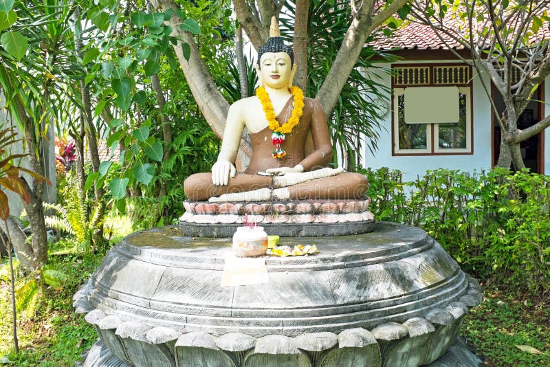 Buddha Statue Under the Bodhi Tree in Bali Indonesia Stock Image ...