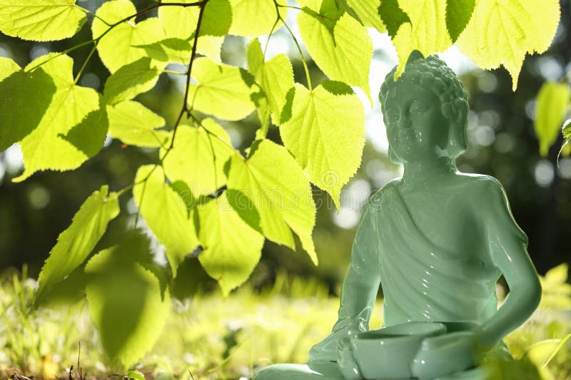 Decorative Buddha Statue Under Tree Branch Outdoors Stock Image - Image ...