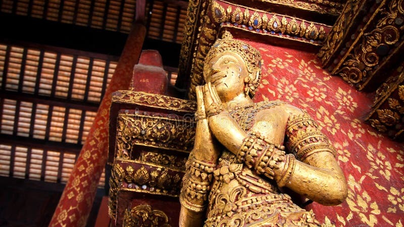 Buddha on the wall corner stock image. Image of gold - 13402247