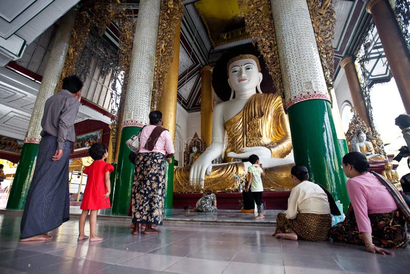 Buddhist Devotee Praying To Statue of Buddha Editorial Photo - Image of ...