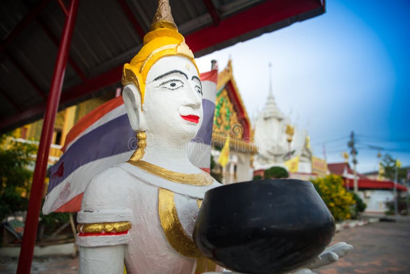 Buddhist God Statue with a Pot on His Hands Stock Image - Image of ...