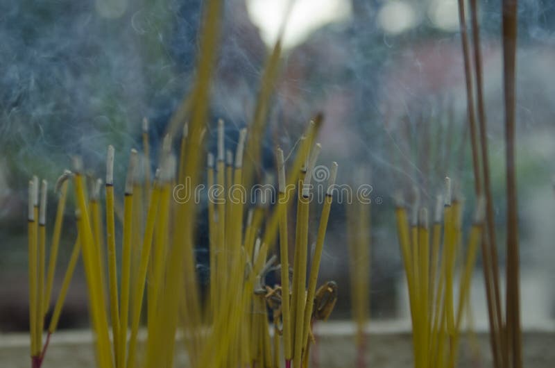 Buddhist Incense Smoke in a Temple Stock Photo - Image of container ...