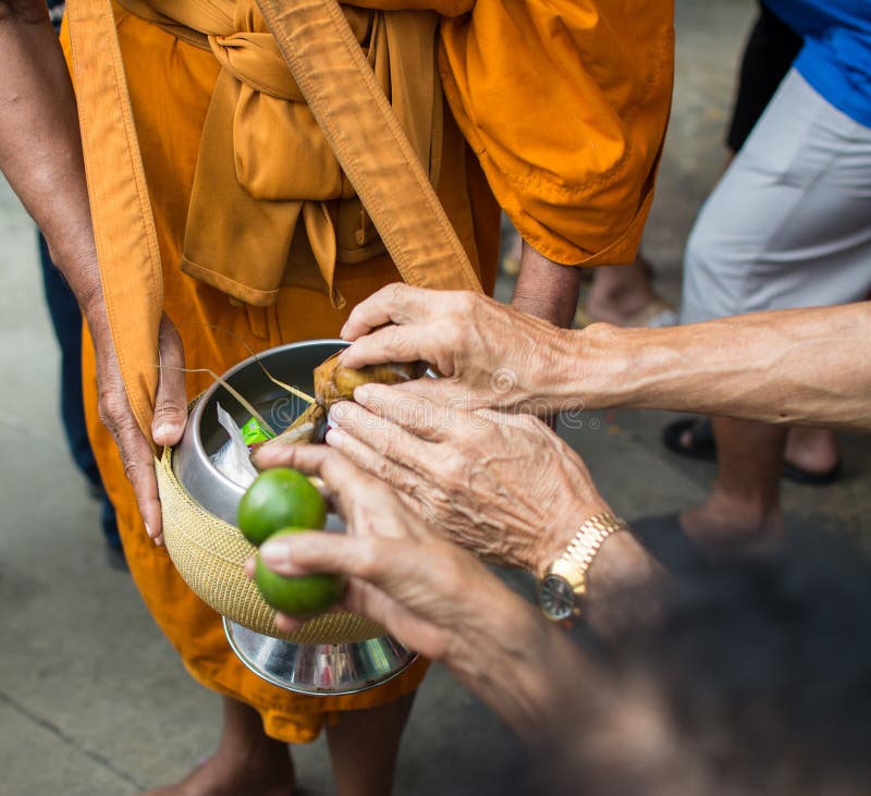 Buddhist Monks are Given Food Offering from People Stock Image - Image ...