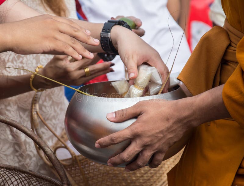 Buddhist Monks are Given Food Offering from People Stock Image - Image ...