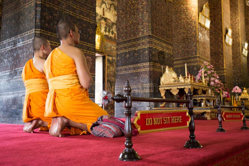 Buddhist Monks Praying in Temple Editorial Photo - Image of gown ...