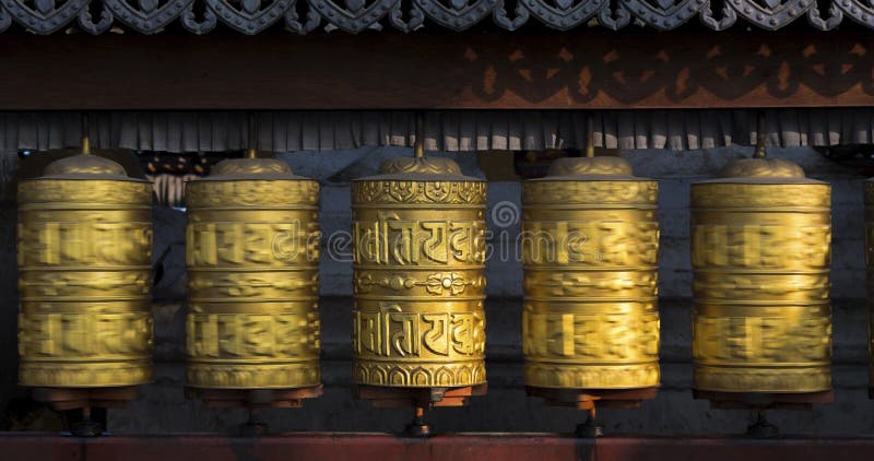 Rotating Buddhist Prayer Wheels As Symbol of Buddhism Religion Stock ...