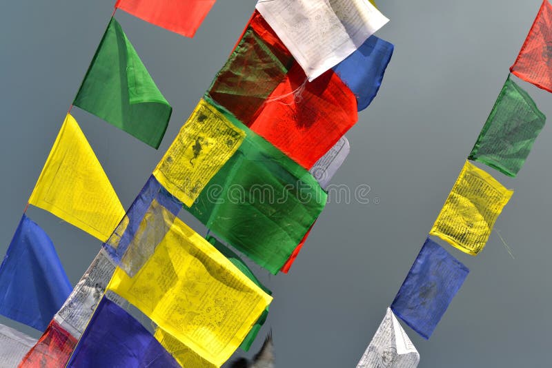 Buddhist Tibetan Prayer Flags Blowing in the Wind Stock Photo - Image ...