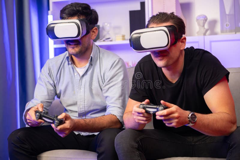 Friend Gamers Playing Video Game Using Joysticks and VR Headset ...