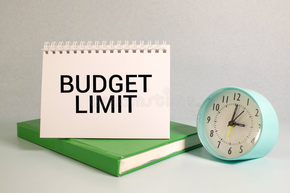 BUDGET LIMIT Text on the Page on the Envelope. on the Work Table Stock ...