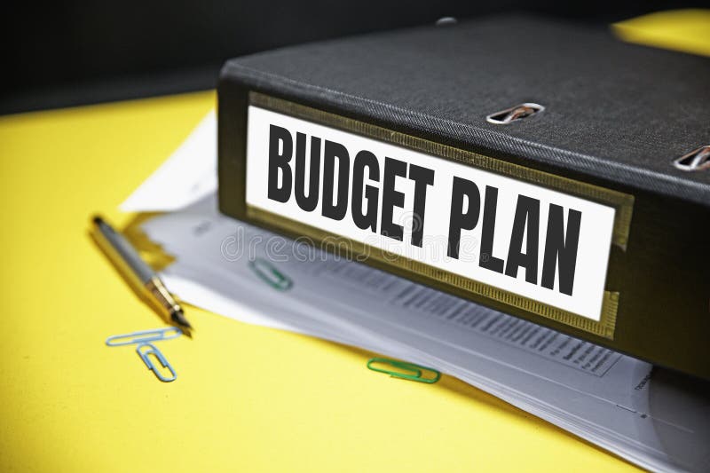 Budget Plan Written on a Ring Binder with Files on a Yellow Surface ...