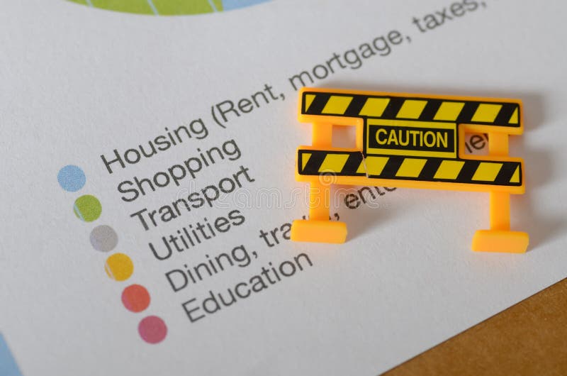 Budget Planning Alert: Caution Symbol on Personal Finance Worksheet ...