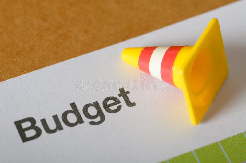 Budget Planning Alert: Caution Symbol on Personal Finance Worksheet ...