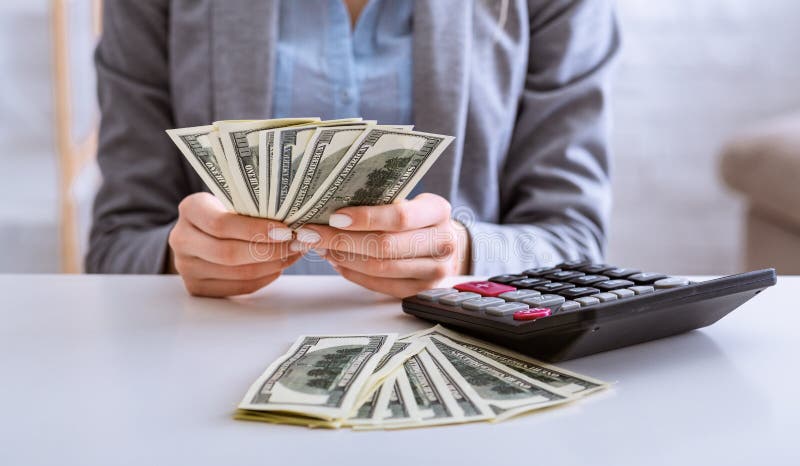 Budget Planning in Crisis. Female Hands Consider Dollars Stock Image ...