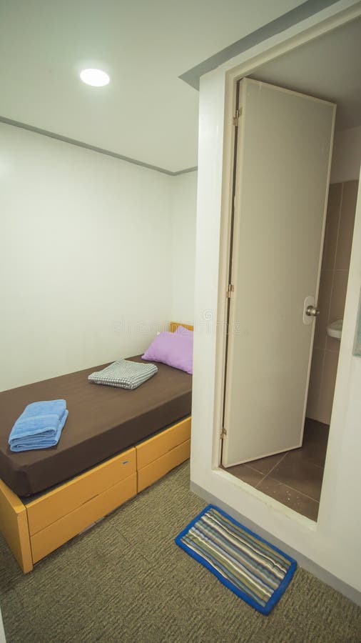 Budget Room in an Asian Hostel for One Bed. Stock Image - Image of ...
