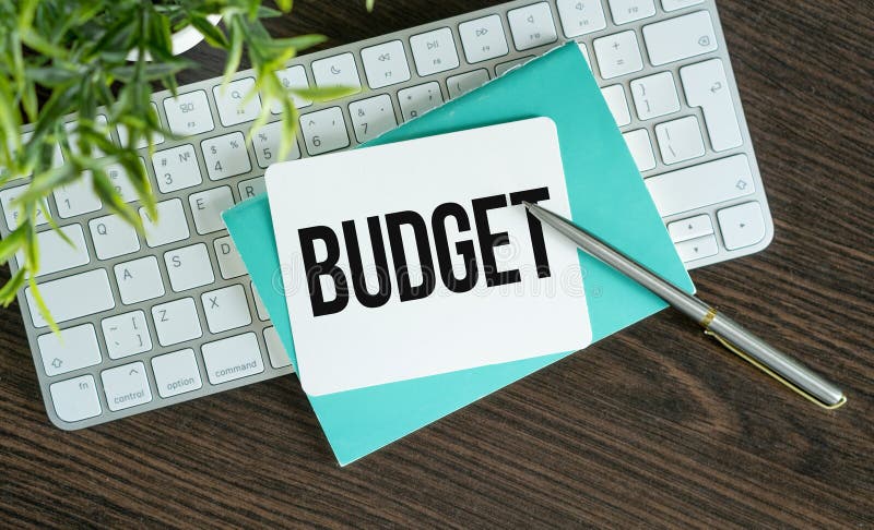 Budget Text Concept. Office Workplace Table with Calculator, Glasses ...