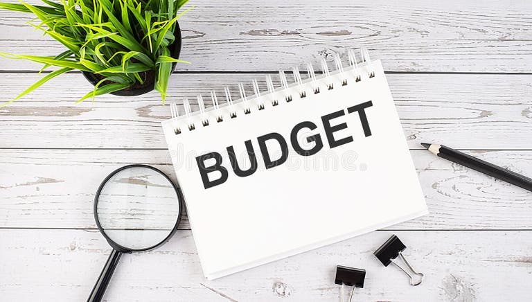 BUDGET Text Concept Write on Notebook with Office Tools on the Wooden ...