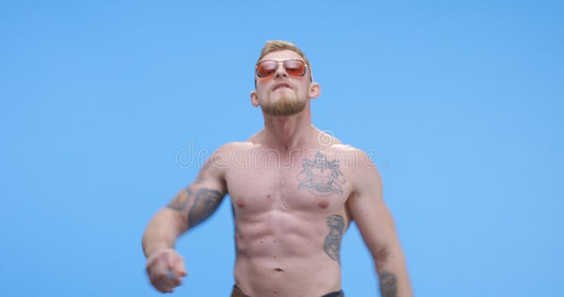 Buff Man Showing Off for Camera Stock Footage - Video of brute ...