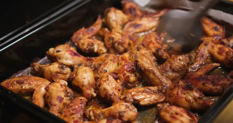 Buffalo Chicken Wings Cooking in Electric Oven Stock Video - Video of ...