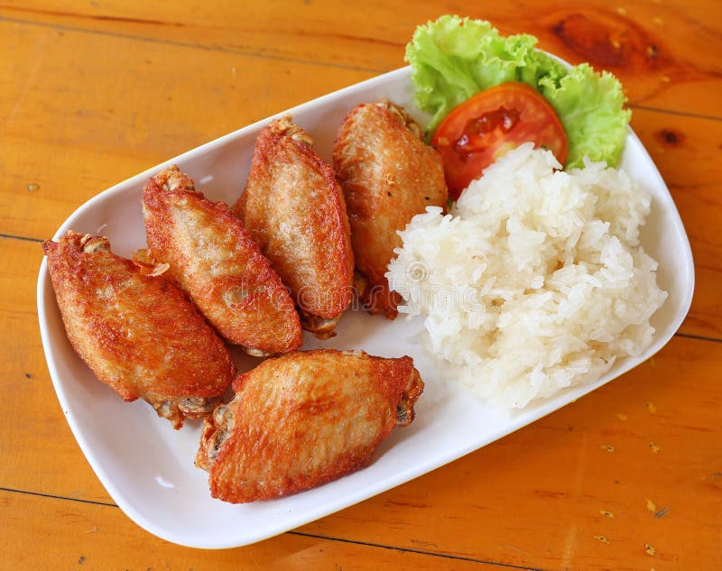 Buffalo Chicken Wings with Sticky Rice Stock Image - Image of chicken ...